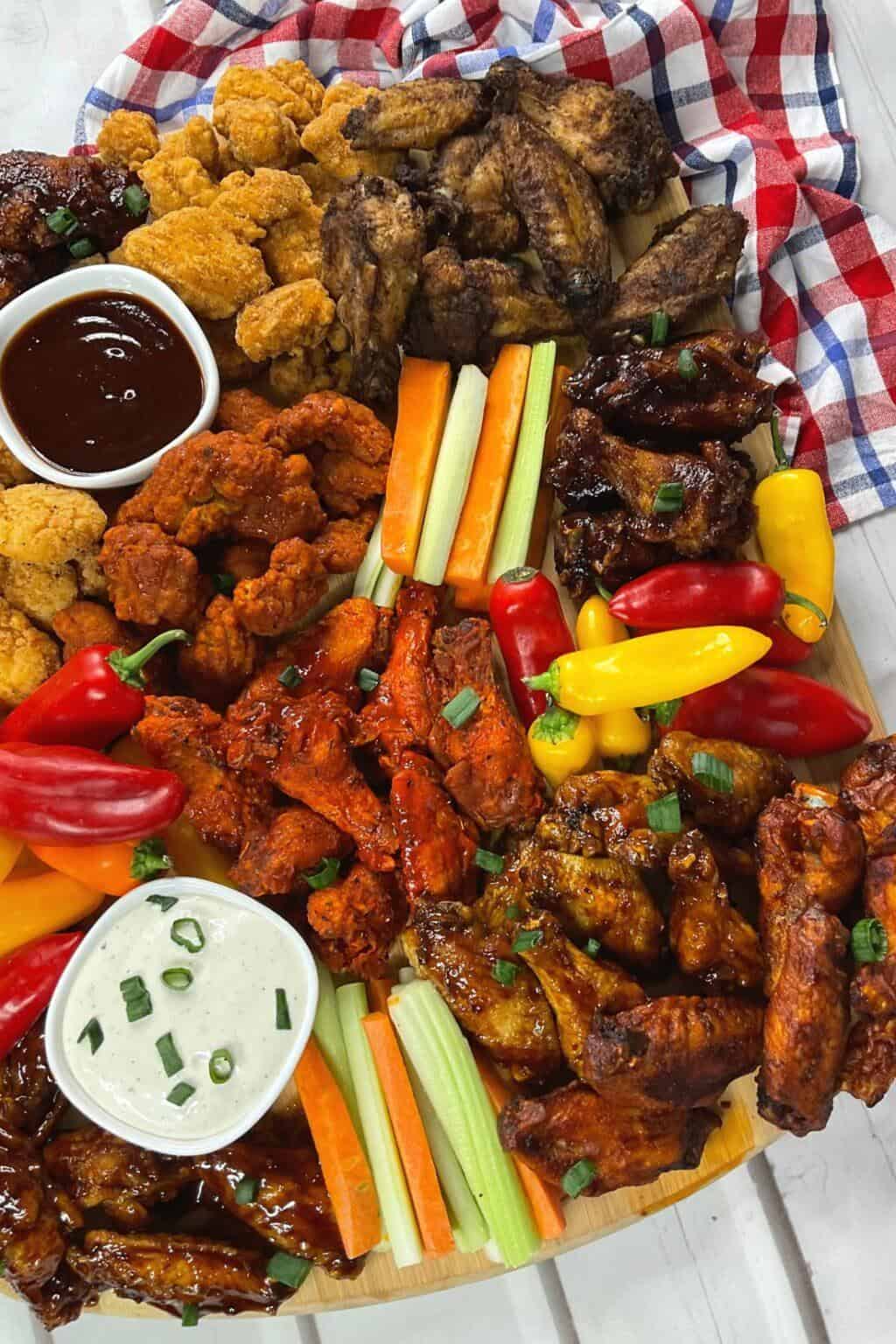 Spice up Your Gathering with our Chicken Wing and Tender Board - A ...
