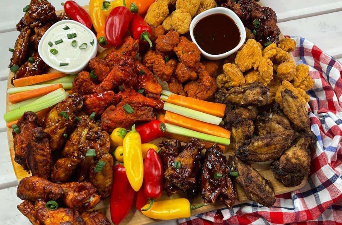 Spice up Your Gathering with our Chicken Wing and Tender Board - A ...