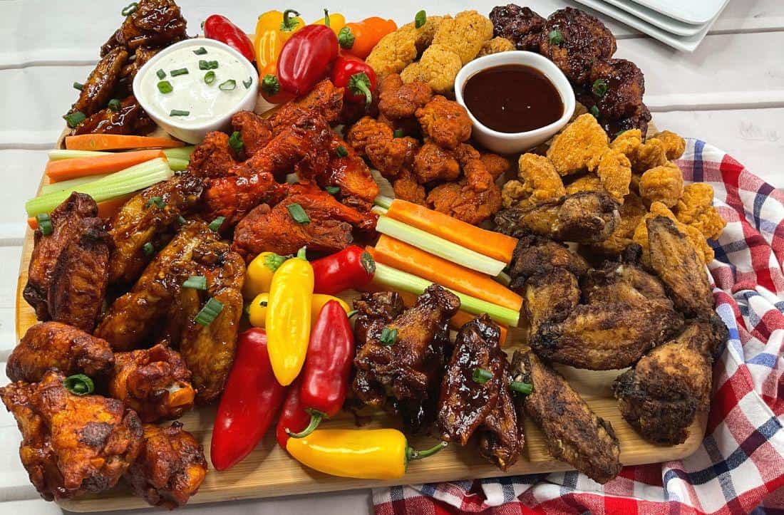 Spice up Your Gathering with our Chicken Wing and Tender Board - A ...